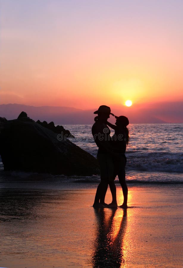 Sweet couple sunset beach stock photo. Image of boyfriend - 10889214