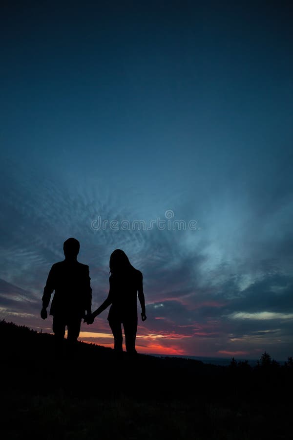 Couple at sunset stock image. Image of silhouette, nature - 59981069