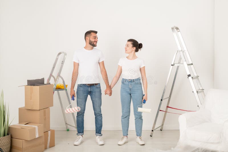 Couple Supporting Each Other while Remodeling Room Stock Photo - Image ...