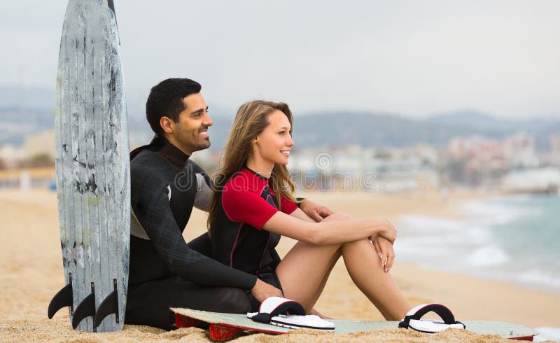Couple with Surf Boards on the Beach Stock Photo - Image of couple ...