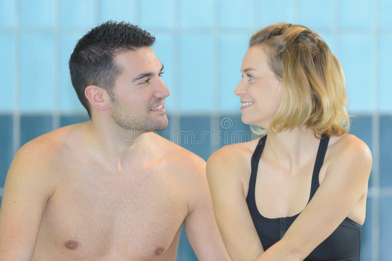 Couple at swimming pool stock photo. Image of male, attractive - 120757736