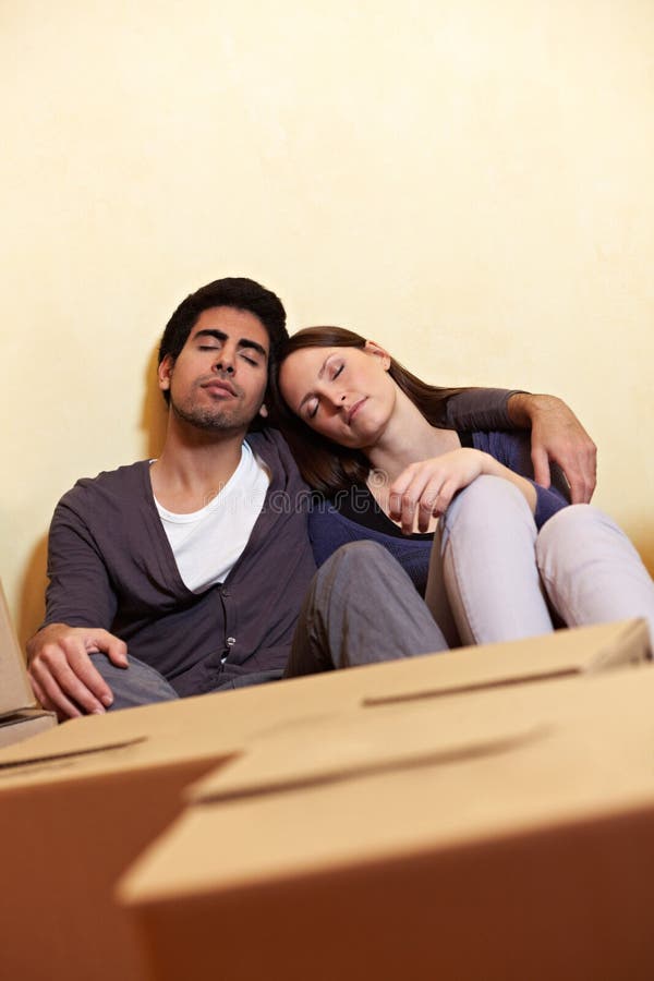 Couple Taking a Break while Moving Stock Image - Image of break, relax ...