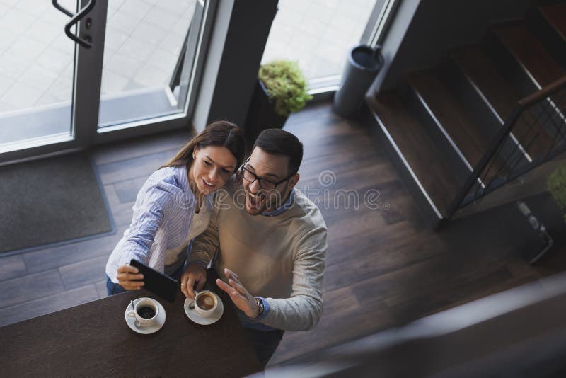 Couple Taking A Selfie In A Coffee Shop Stock Image Image Of Female