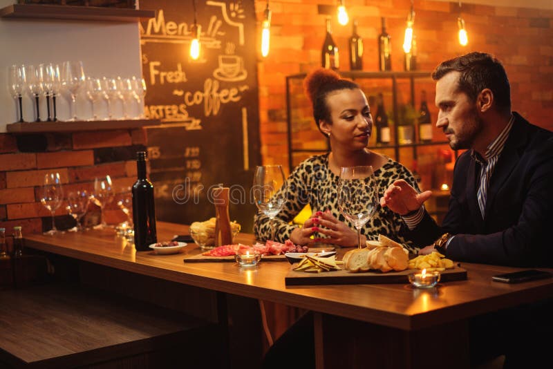 Couple Talking Behind Bar Counter in a Cafe Stock Photo - Image of ...