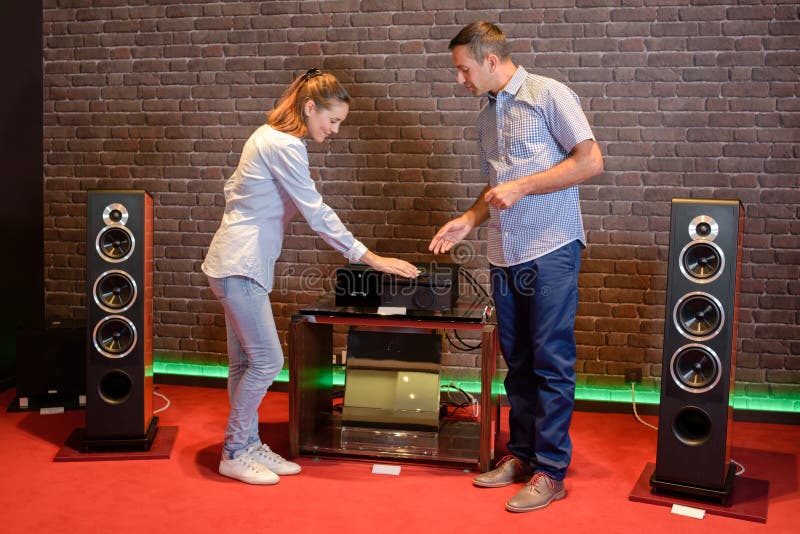 Couple Testing Home Sound System Stock Photo - Image of women, display ...