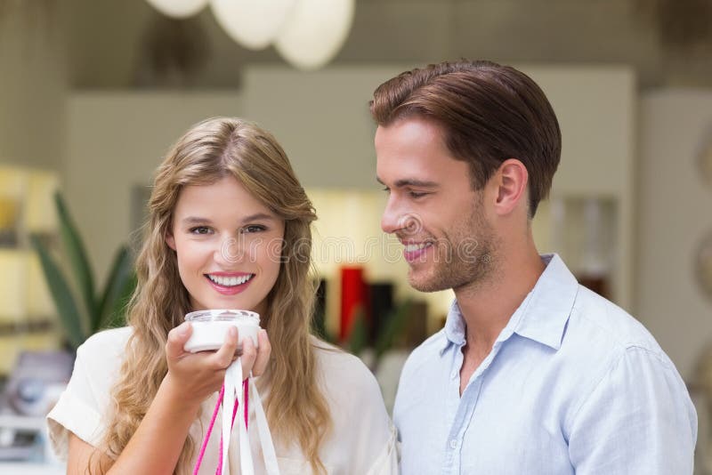 A Couple Testing a Sample of Beauty Products Stock Image - Image of ...