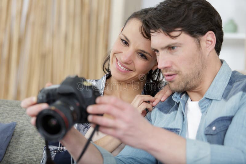 Couple Tourists Watching Photos from Digital Camera Stock Photo - Image ...