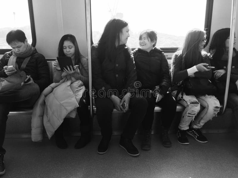 Couple in the train editorial photography. Image of wearing - 77615907