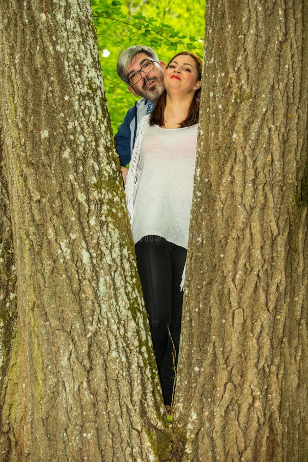 Couple between trees stock photo. Image of couple, loving - 92499718