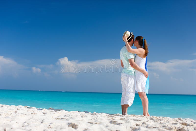 Couple at tropical beach stock image. Image of leisure - 45765873