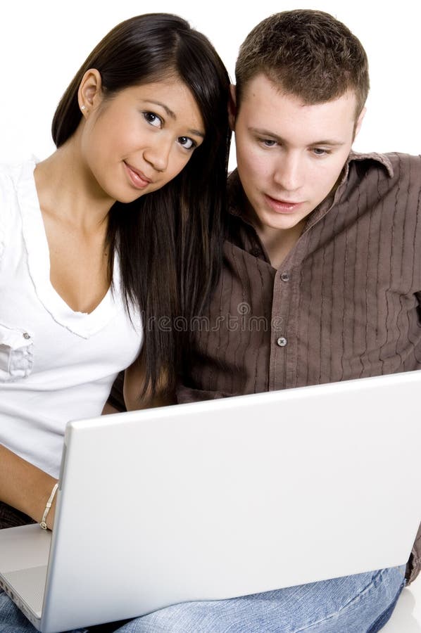 Couple using Laptop stock image. Image of notebook, internet - 771821