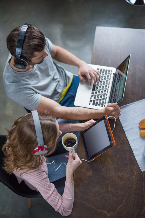 Couple using devices stock photo. Image of computer, togetherness ...