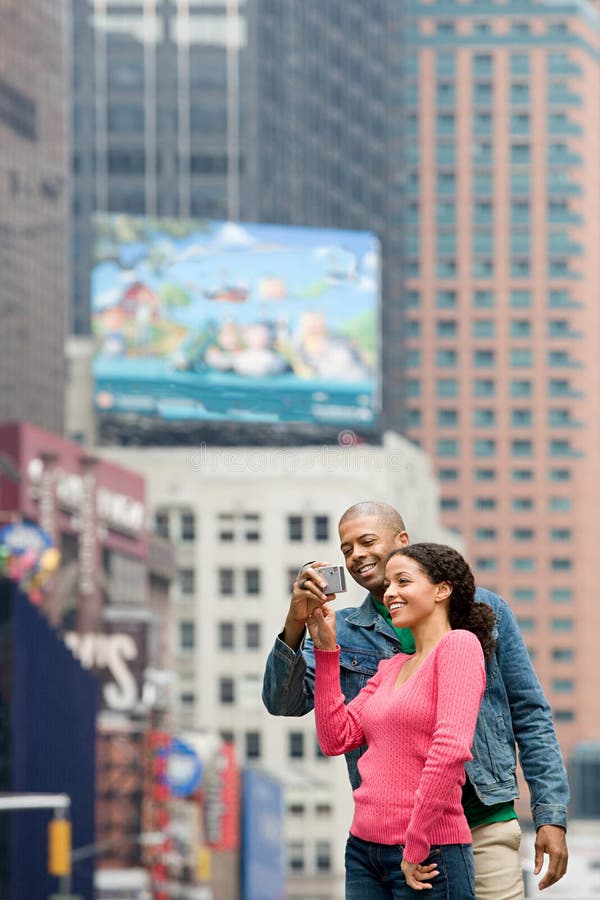Couple Using Digital Camera Stock Image - Image of enjoyment, holding ...