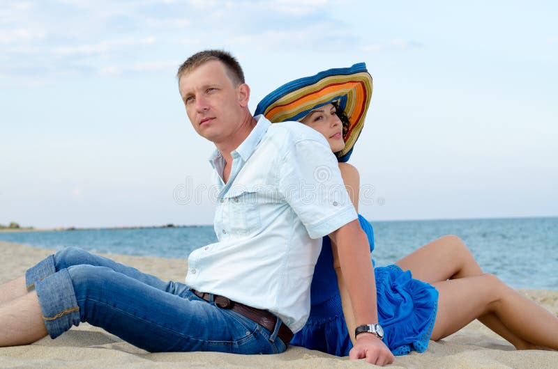 Couple Using Each Other As Backrests Stock Image - Image of adult, cute ...
