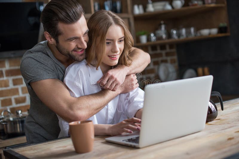 Couple using laptop stock image. Image of smiling, boyfriend - 90274869