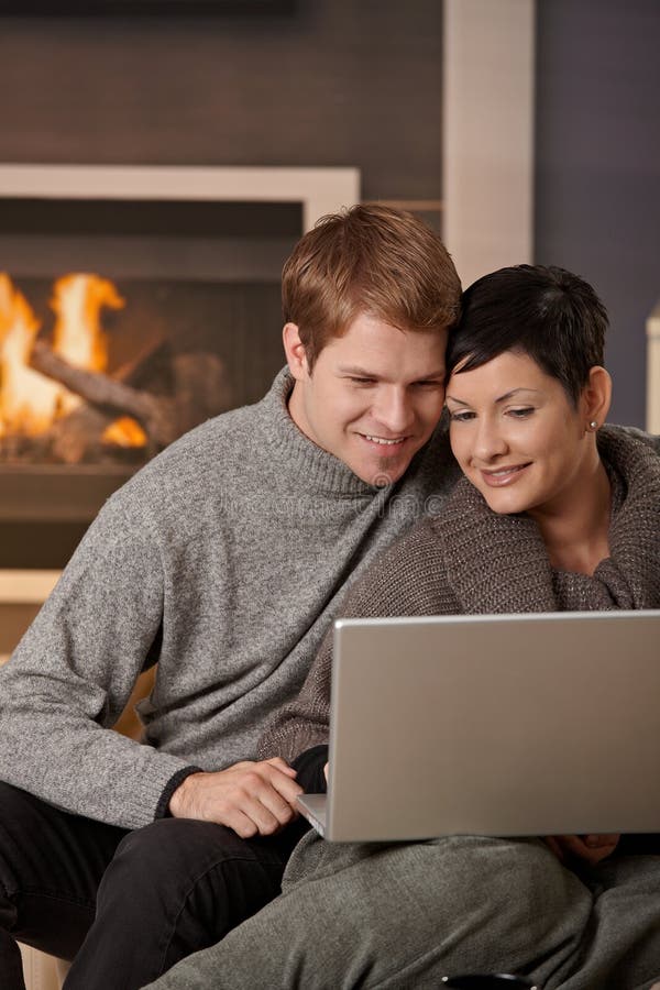 Couple Using Laptop at Winter Stock Photo - Image of attractive, face ...