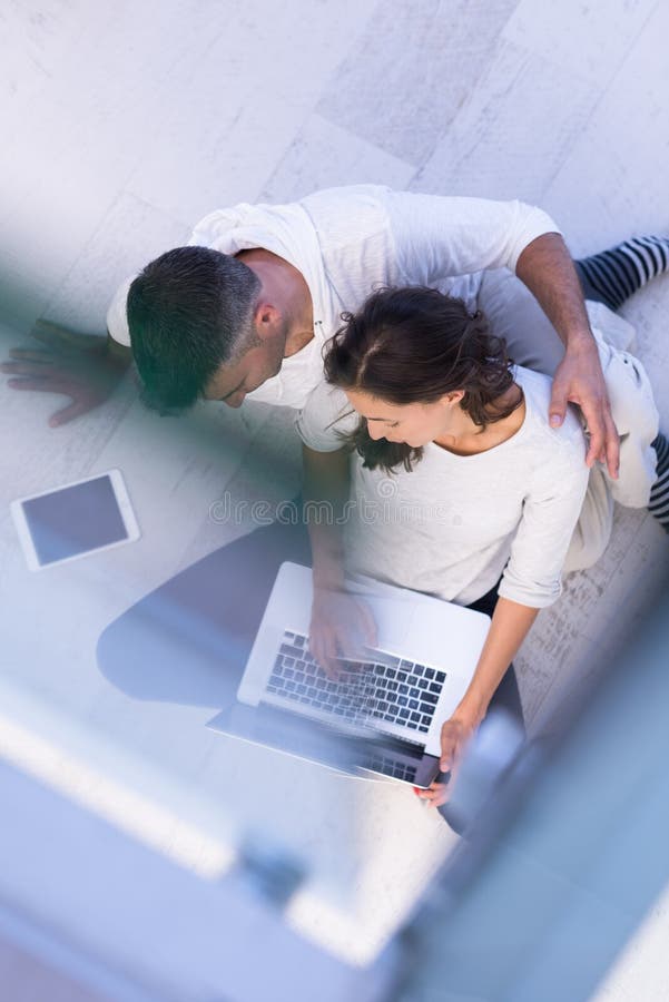Couple Using Tablet and Laptop Computers Top View Stock Image - Image ...