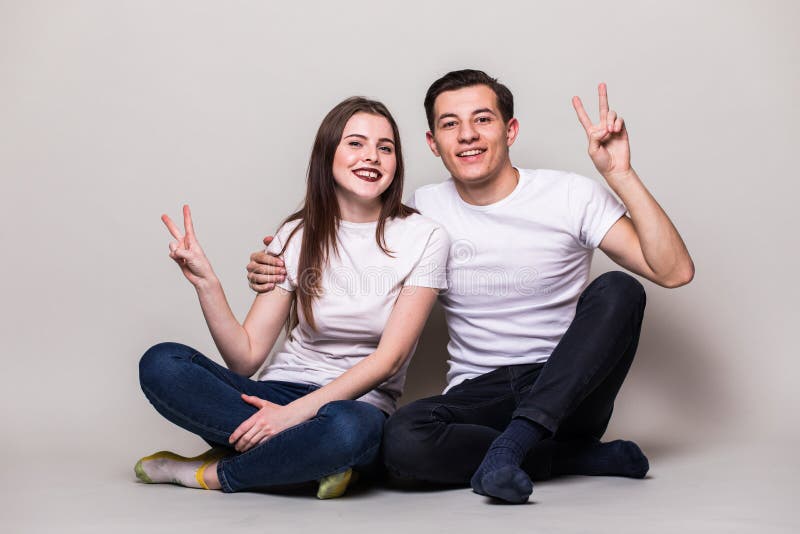 Couple with victory sign stock image. Image of closeup - 82203755
