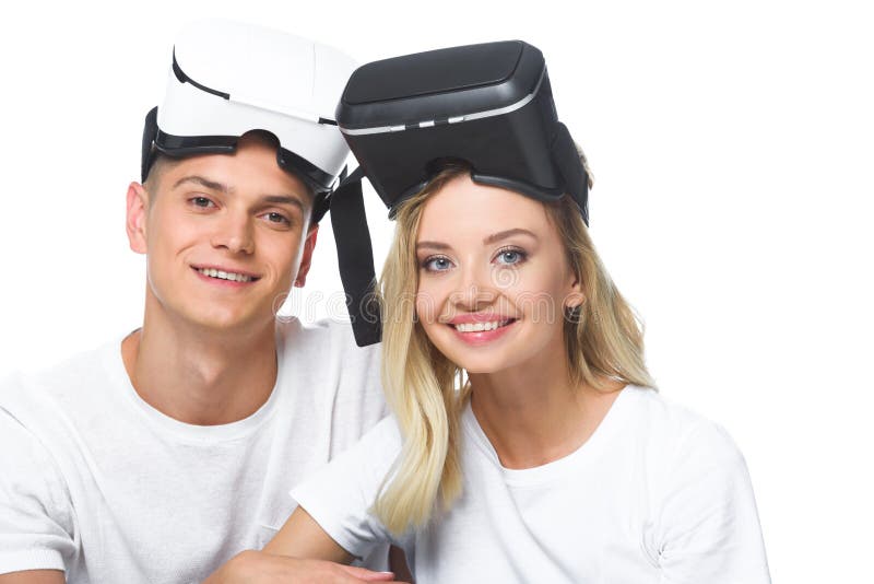 Couple with Virtual Reality Headsets Looking at Camera Stock Photo ...