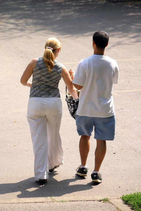 Couple Walking Away Stock Photos - Download 1,941 Royalty Free Photos