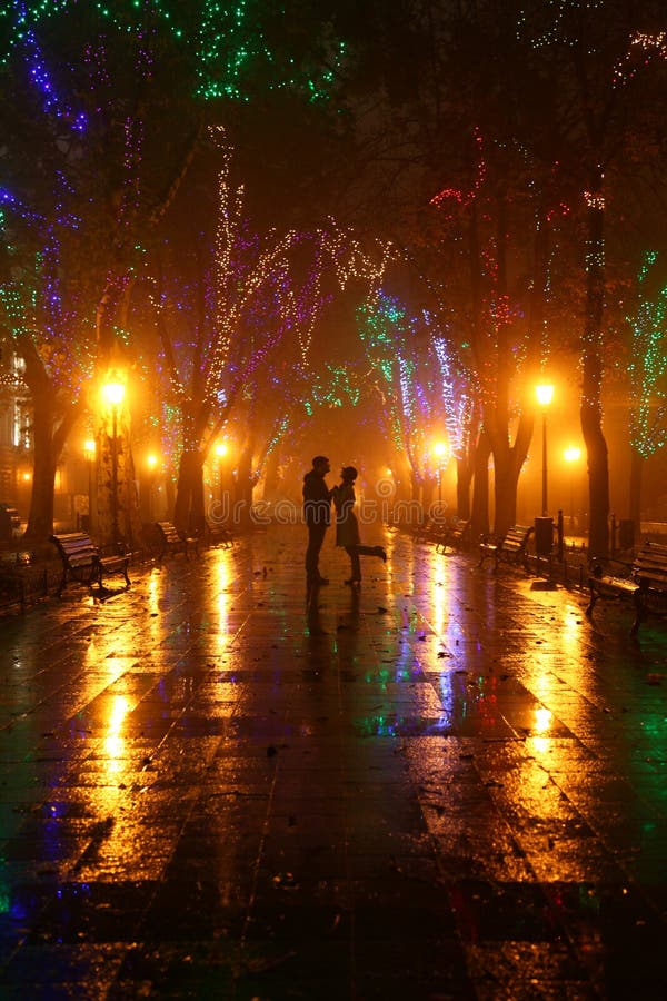 Couple Walking at Alley in Night Lights. Stock Photo - Image of ...