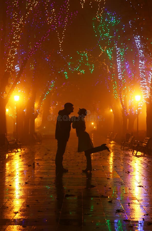 Couple Walking at Alley in Night Lights. Stock Photo - Image of ...