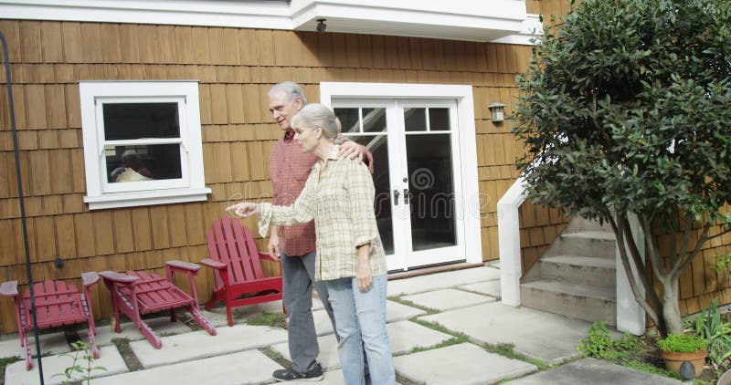 Couple Walking Around Looking at Beautiful Garden Stock Footage - Video ...