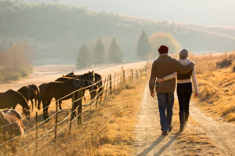 Couple walking farm road stock image. Image of countryside - 43001621
