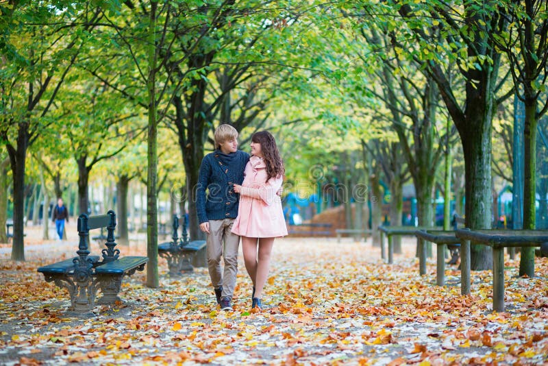 Couple Walking Together on a Fall Day in Paris Stock Photo - Image of ...
