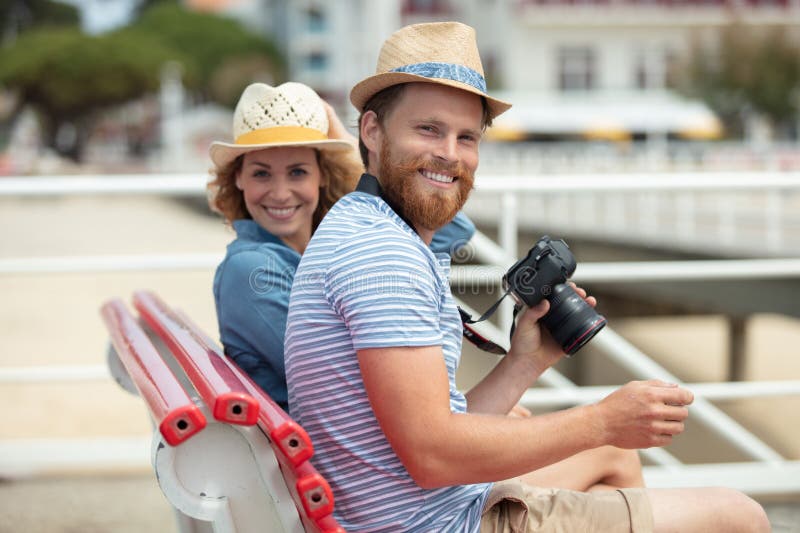 Couple Watching Photos from Walk on Professional Camera Stock Photo ...