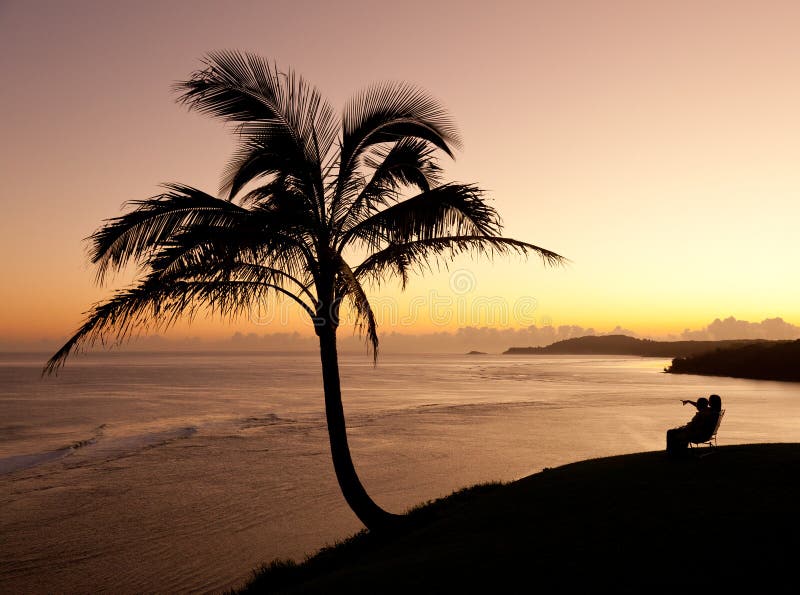 Couple Watching Sunrise in Kauai Stock Photo - Image of cloud, seaside ...