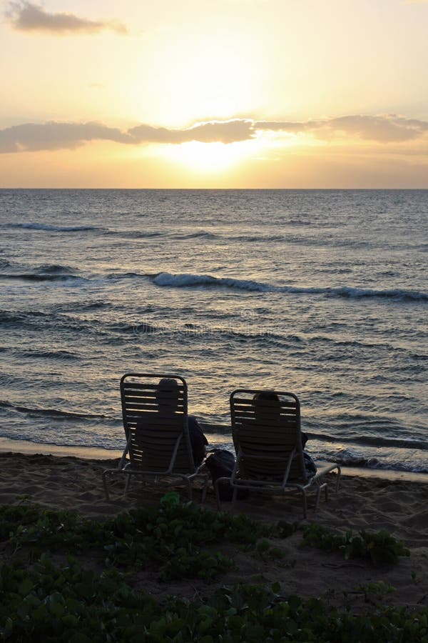 Couple Watching the Sunset stock image. Image of love - 4914257