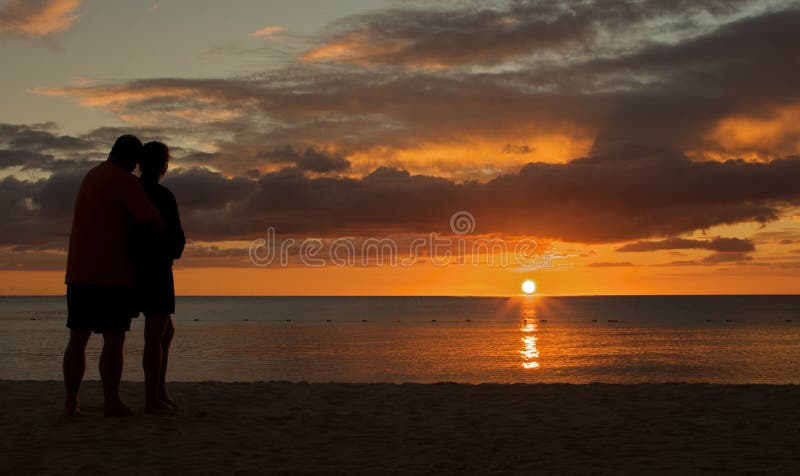 Couple Watching Sunset on the Beach Stock Photo - Image of love ...