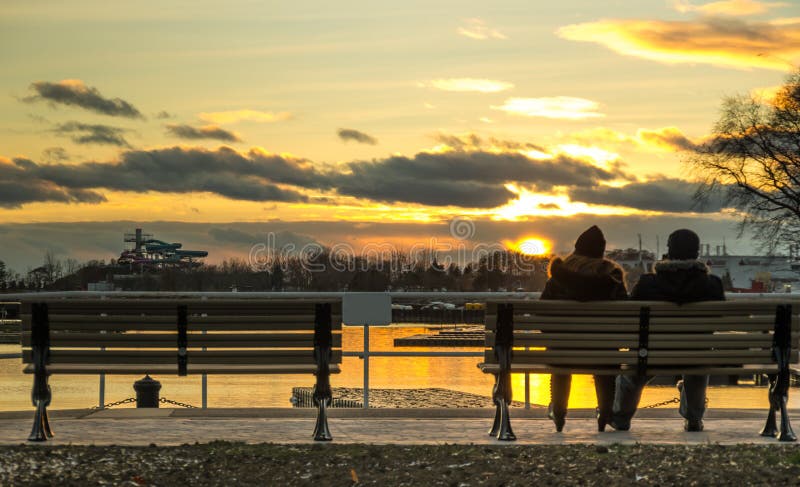 Couple watching the sunset stock image. Image of love - 35610955