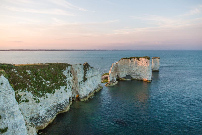 Couple Watching Sunset on Old Harry Rocks White Cliffs and Bournemouth ...