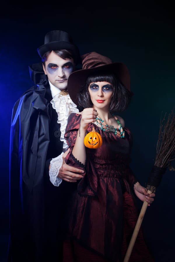 Couple Wearing As Vampire and Witch. Stock Image - Image of mystery ...