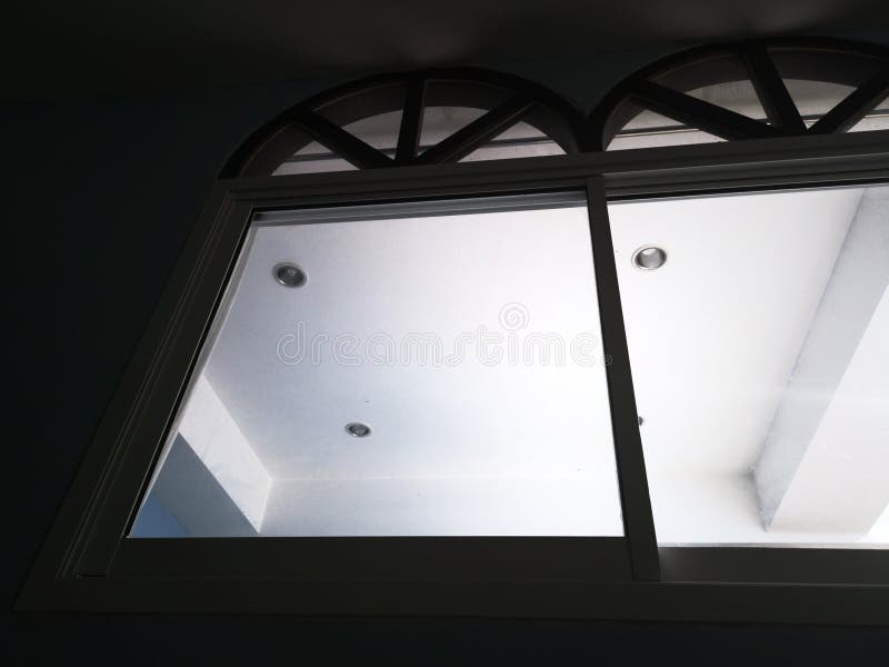 A Couple Window and Lighting Inside Stock Image - Image of couple ...