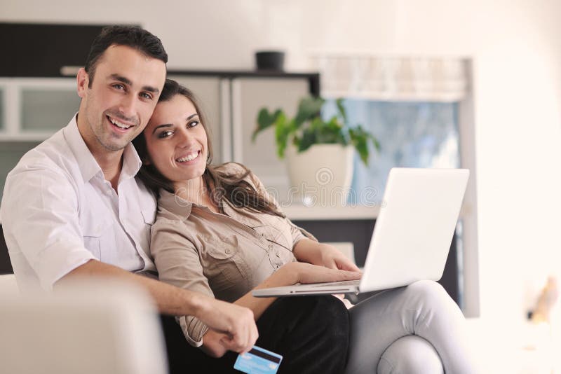 Couple Work on Laptop Computer at Modern Home Stock Image - Image of ...
