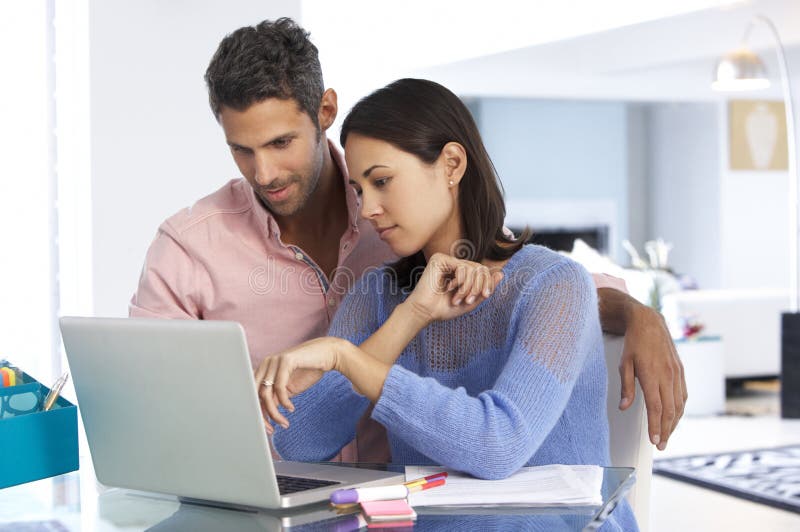 Couple Working at Laptop in Home Office Stock Photo - Image of ...