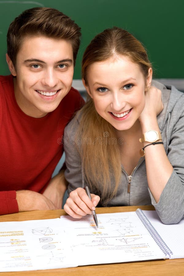 Couple Working Together on School Work Stock Photo - Image of people ...