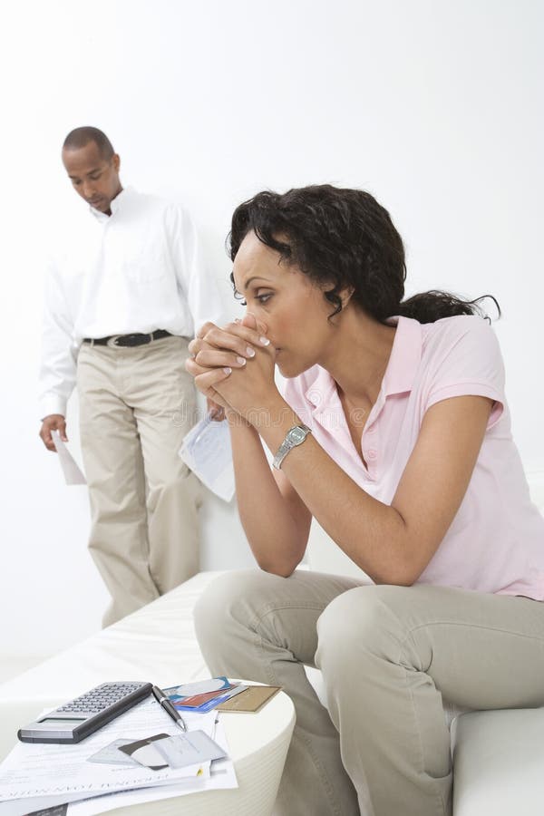 Couple Worried about Money stock photo. Image of calculator - 29661154