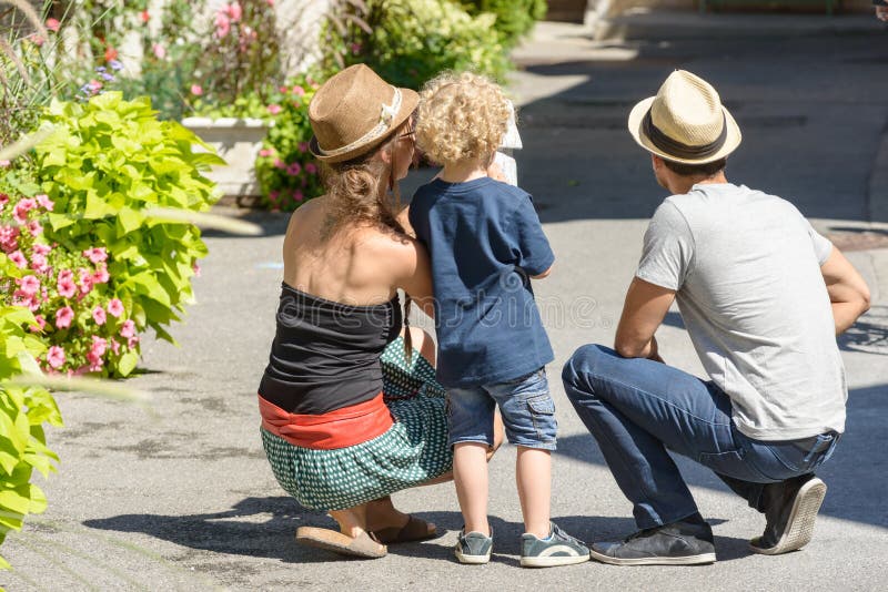 A Couple with a Young Child on Holiday Stock Photo - Image of happy ...