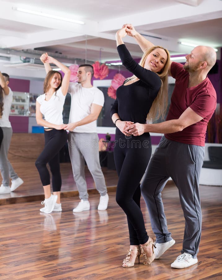 Couples dancing tango stock image. Image of fashion, skill - 10973401