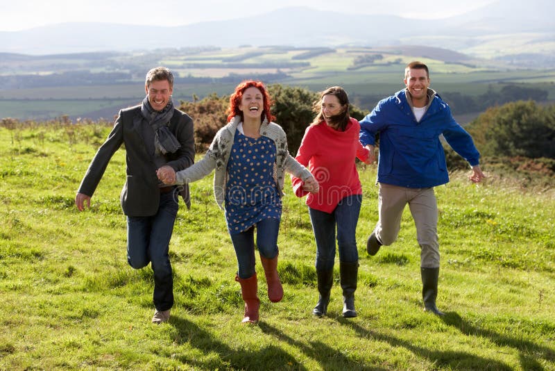 Couples Holding Hands on Country Walk Stock Image - Image of fall ...