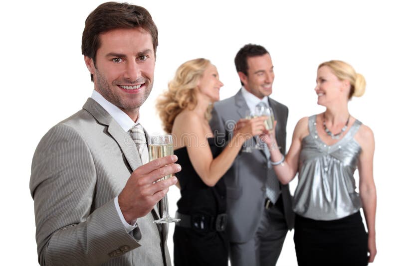 Two couples partying stock image. Image of sofa, people - 23492379