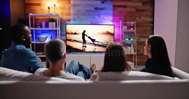 Couples Watching TV at Night Stock Image - Image of control, african ...