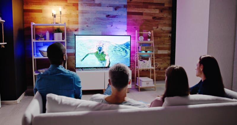 Couples Watching TV at Night Stock Photo - Image of people, cinema ...