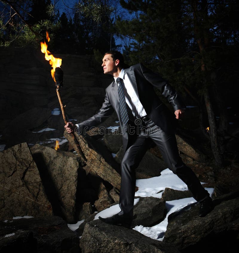 Courageous leader stock photo. Image of holding, flame - 12823480