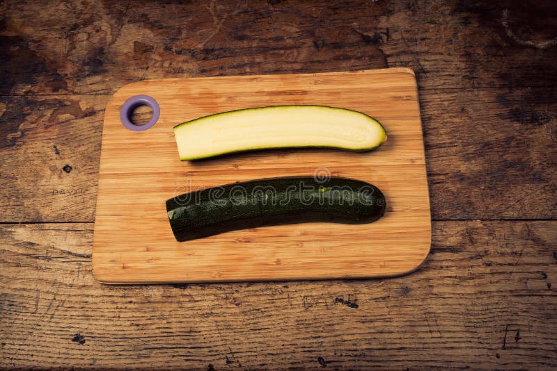 Courgette on Chopping Board Stock Photo - Image of sliced, table: 40173352