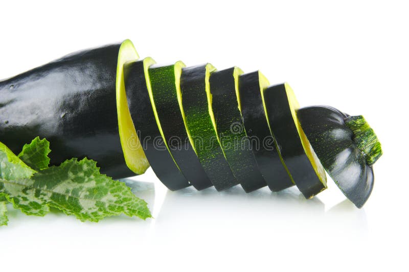 Courgette Cut into Slices and Leaves on White Stock Image - Image of ...